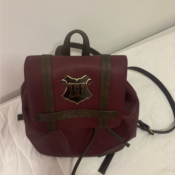 Hot Topic | Bags | Harry Potter Mini Backpack Hogwarts Alumni | Poshmark